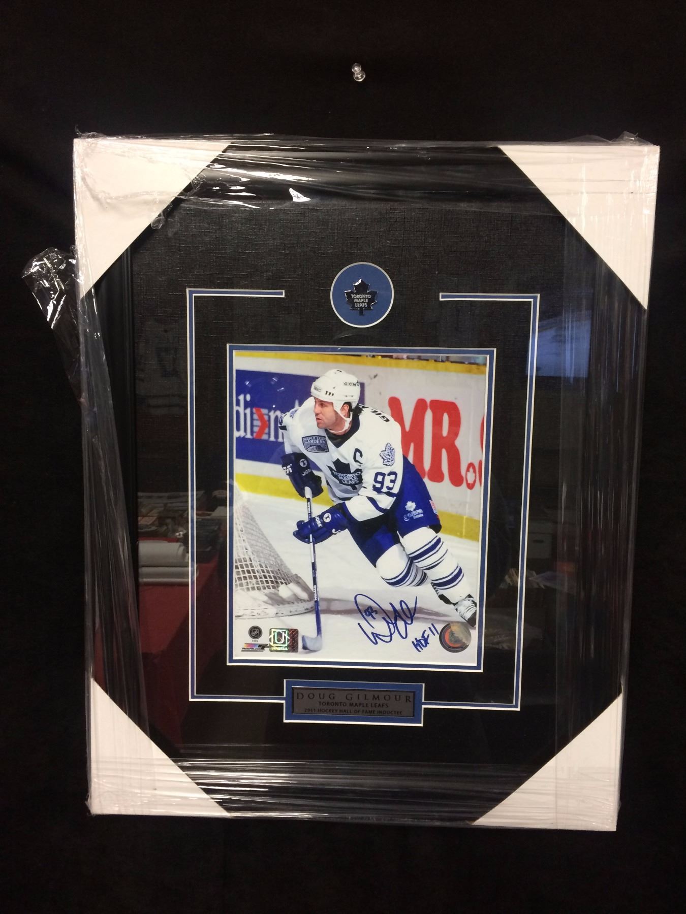 DOUG GILMOUR AUTOGRAPHED 18' X 18" FRAMED PHOTO W/ COA