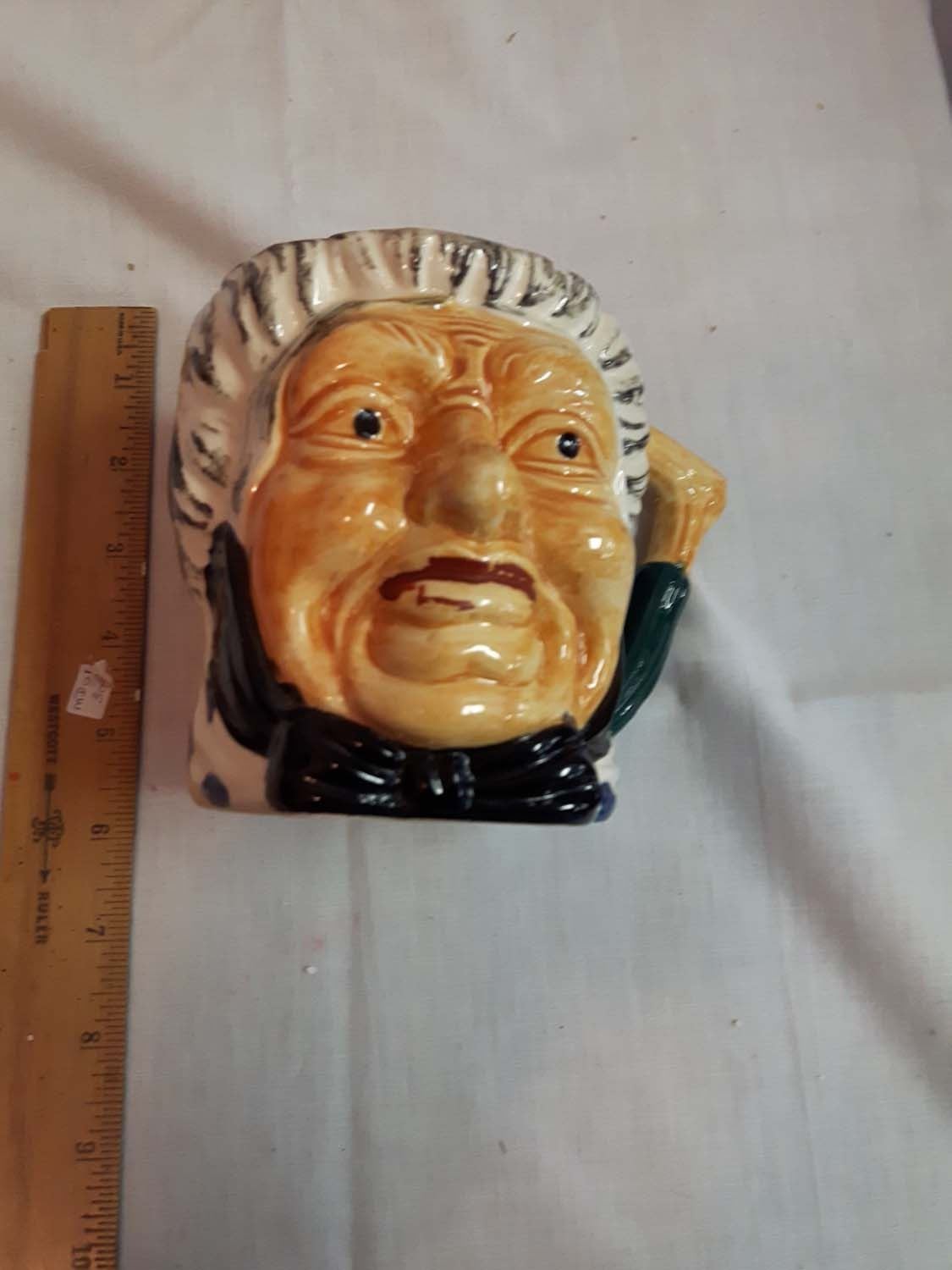 Two Large Ceramic Head Mugs