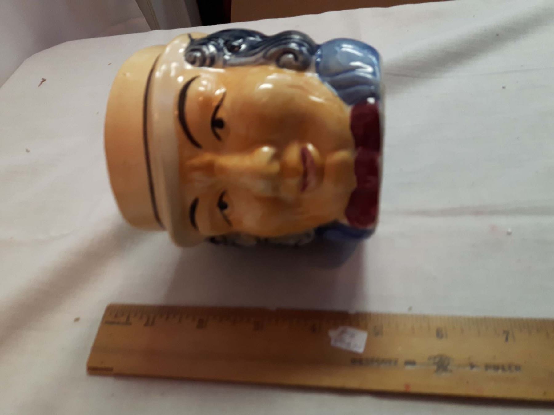 Two Large Ceramic Head Mugs