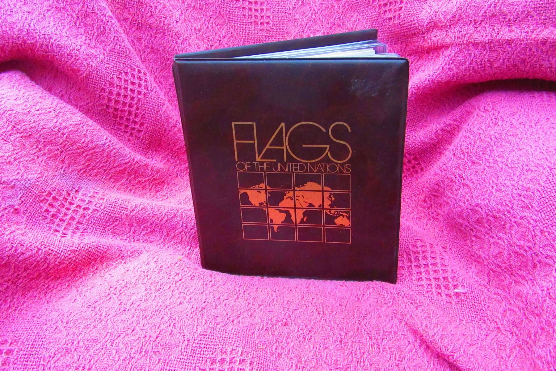1983 FLAGS OF THE UNITED NATIONS - FIRST DAY COVERS IN ALBUM