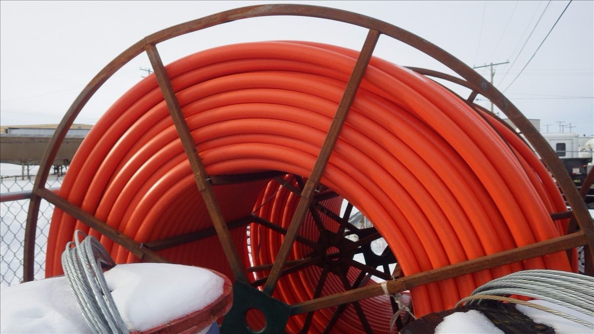 ONE SPOOL OF HDPE PIPE AND ONE PARTIAL SPOOL