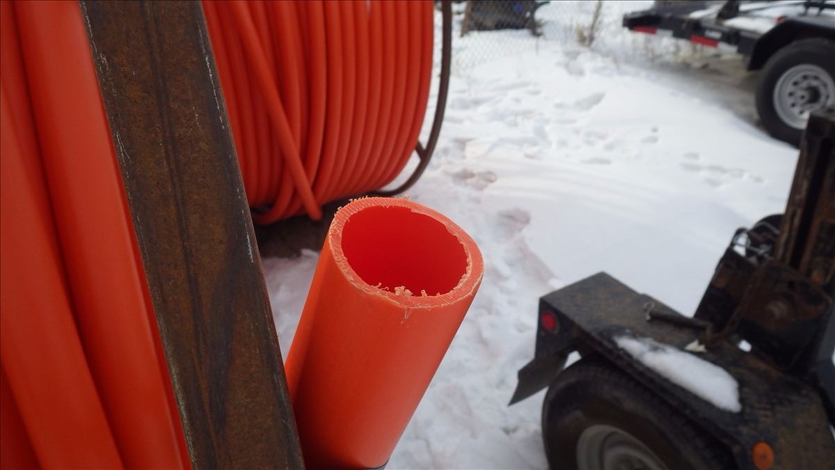 ONE SPOOL OF HDPE PIPE AND ONE PARTIAL SPOOL