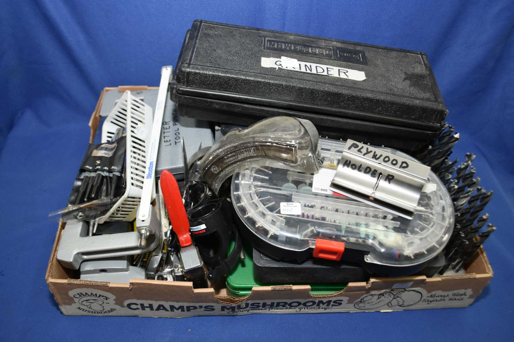 Selection of hand tools including Craftsman grinder, Dremel rotary tool ...