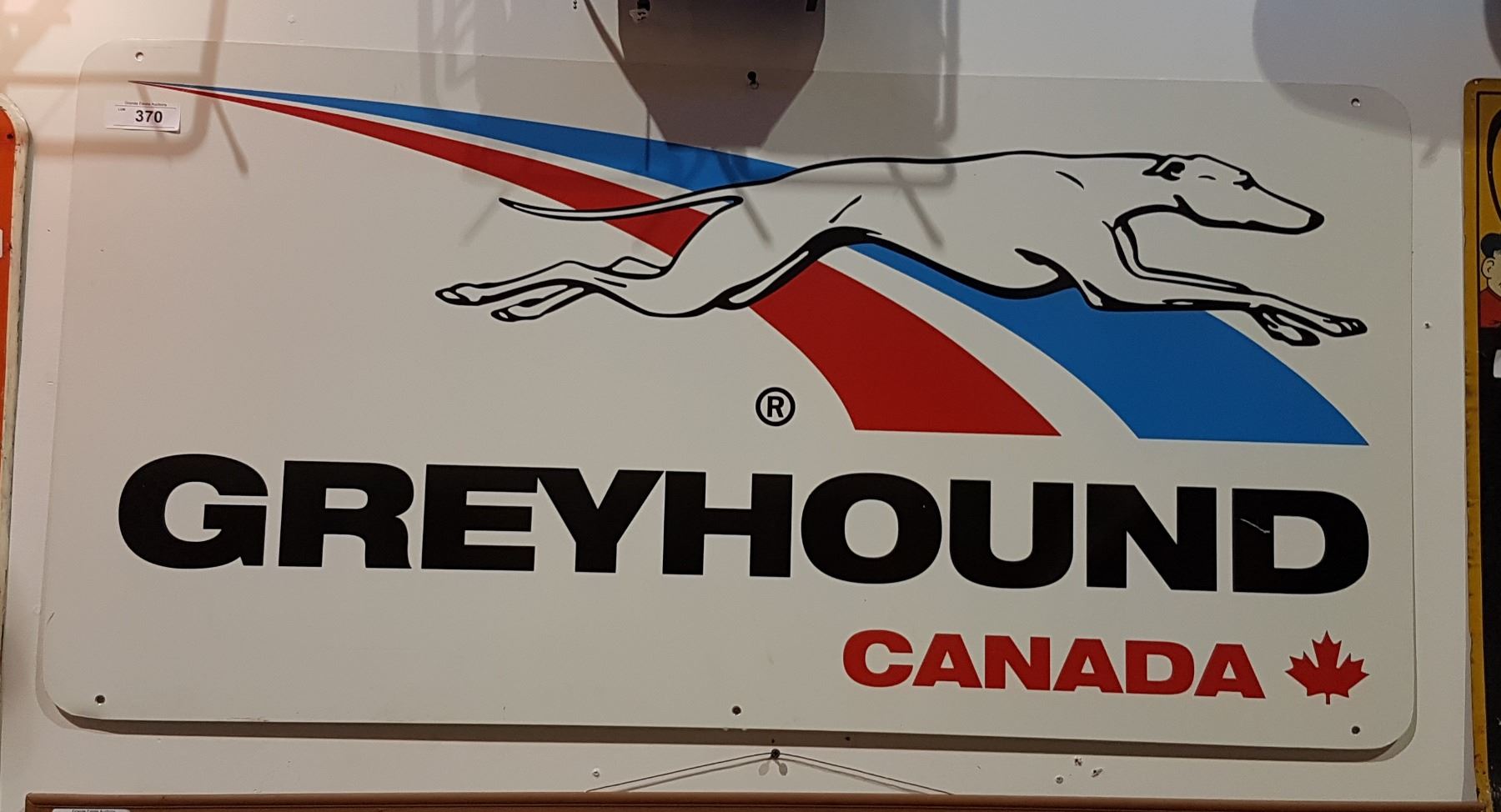 GREYHOUND METAL SIGN