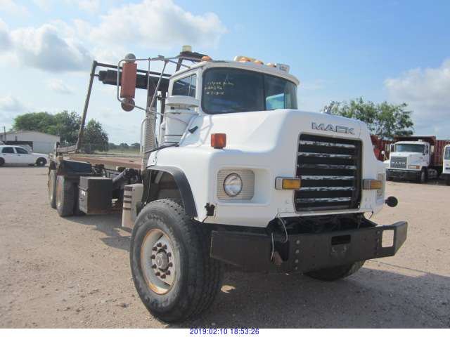 2003 - MACK DM600 ROLL OFF TRUCK