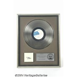 The Beatles Platinum RIAA Award Presented to