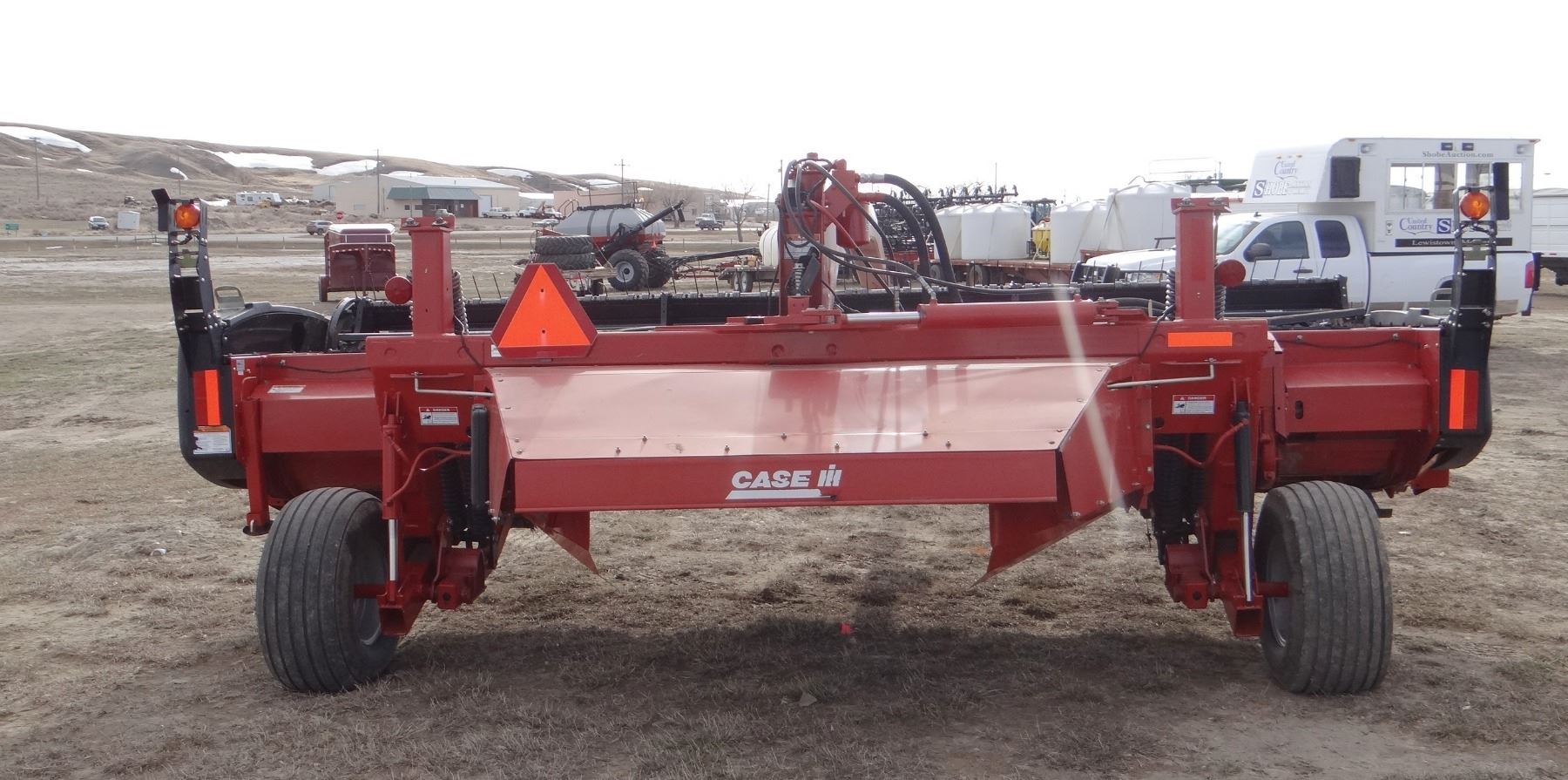 2012 Case IH HDX162 swing-tongue swather, 16’