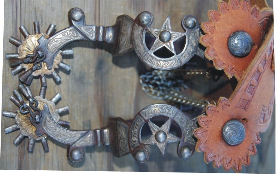 E Garcia silver inlaid Elko star spurs