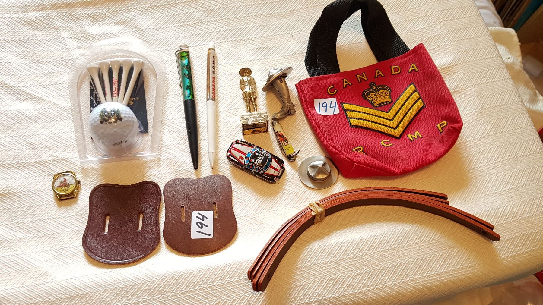 RCMP COLLECTIBLE LOT, RARE TOY WATCH, TIN CAR, KNIFE ETC