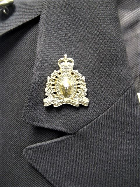 1960's era RCMP brown Tunic all original badges and buttons size 40