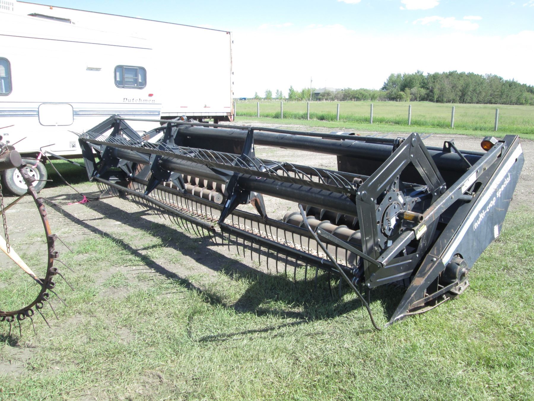 18' MACDON MODEL 940 MULTICROP HEADER C/W PICKUP REEL