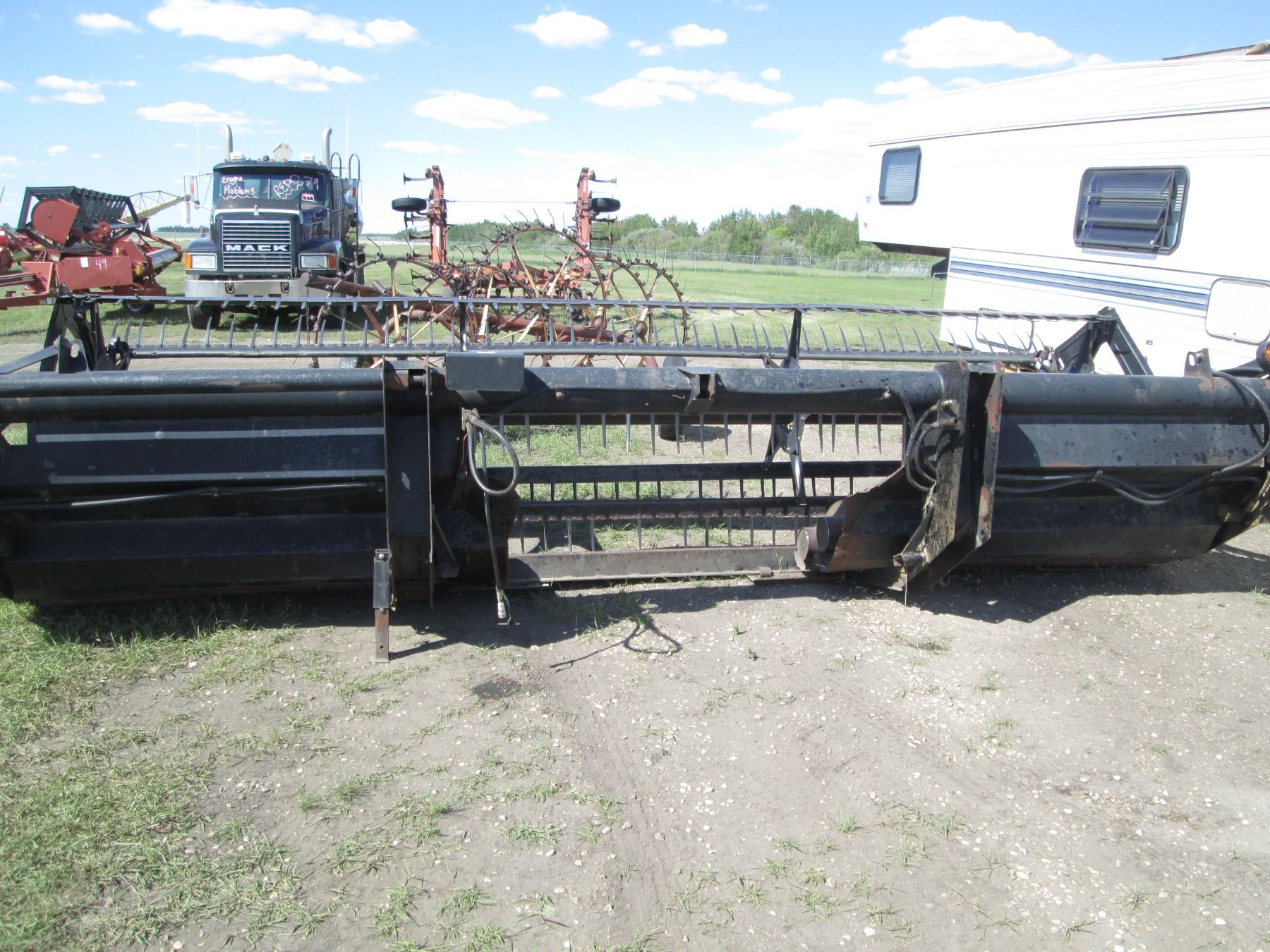 18' MACDON MODEL 940 MULTICROP HEADER C/W PICKUP REEL