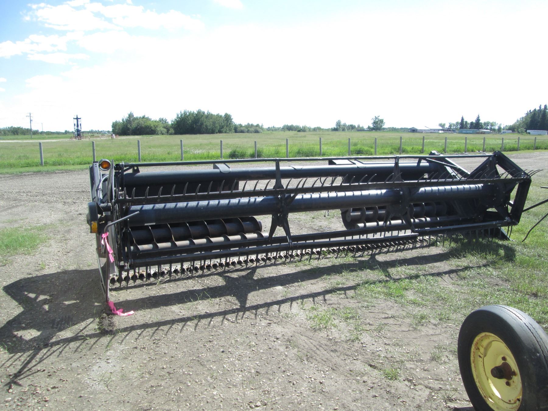 18' MACDON MODEL 940 MULTICROP HEADER C/W PICKUP REEL
