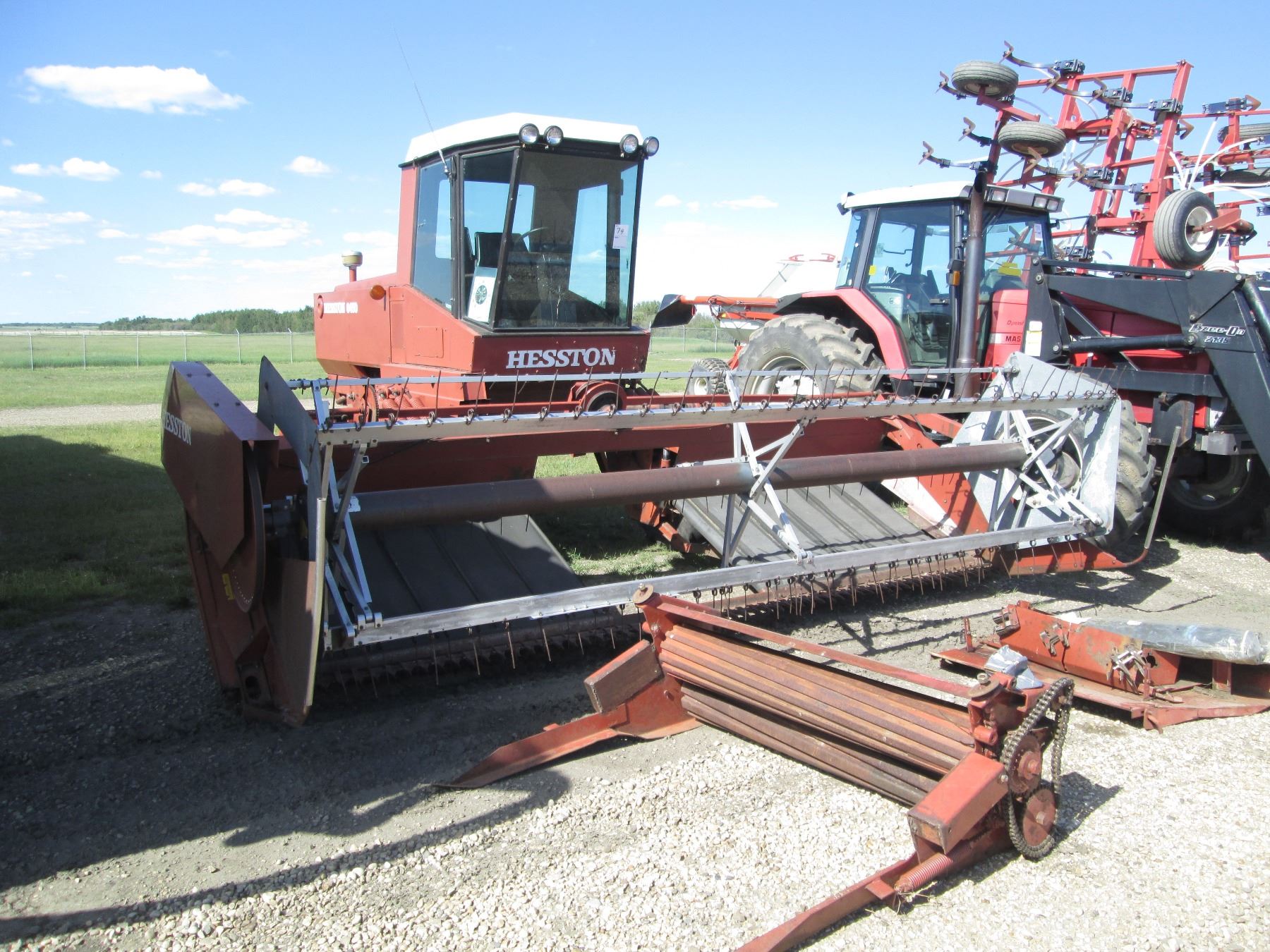 15' HESSTON 6450 SWATHER, CAB, AIR, C/W HAY CRIMPER, 2 EXTRA KNIVES ...