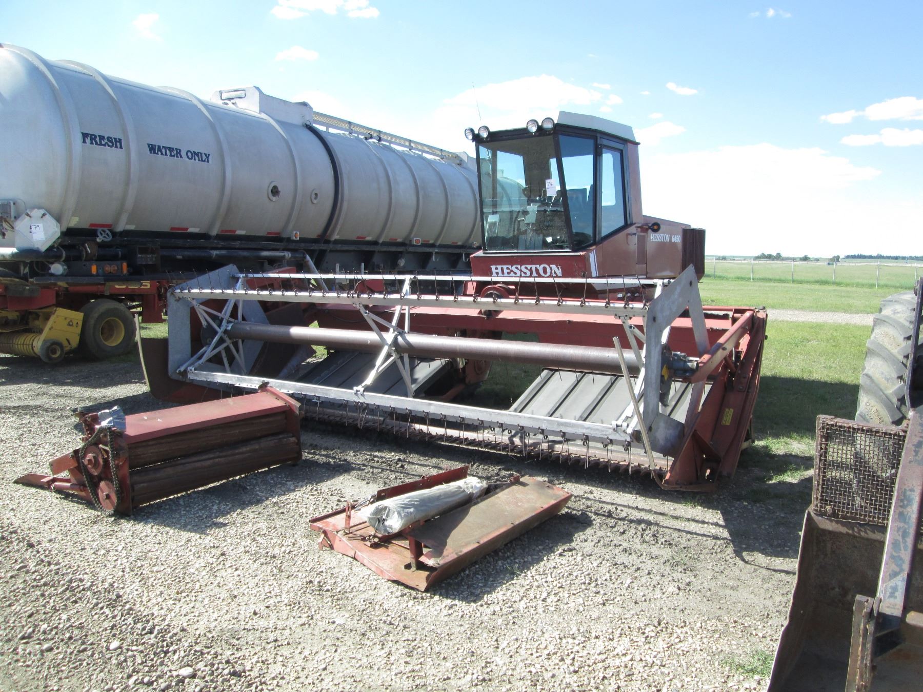 15' HESSTON 6450 SWATHER, CAB, AIR, C/W HAY CRIMPER, 2 EXTRA KNIVES ...