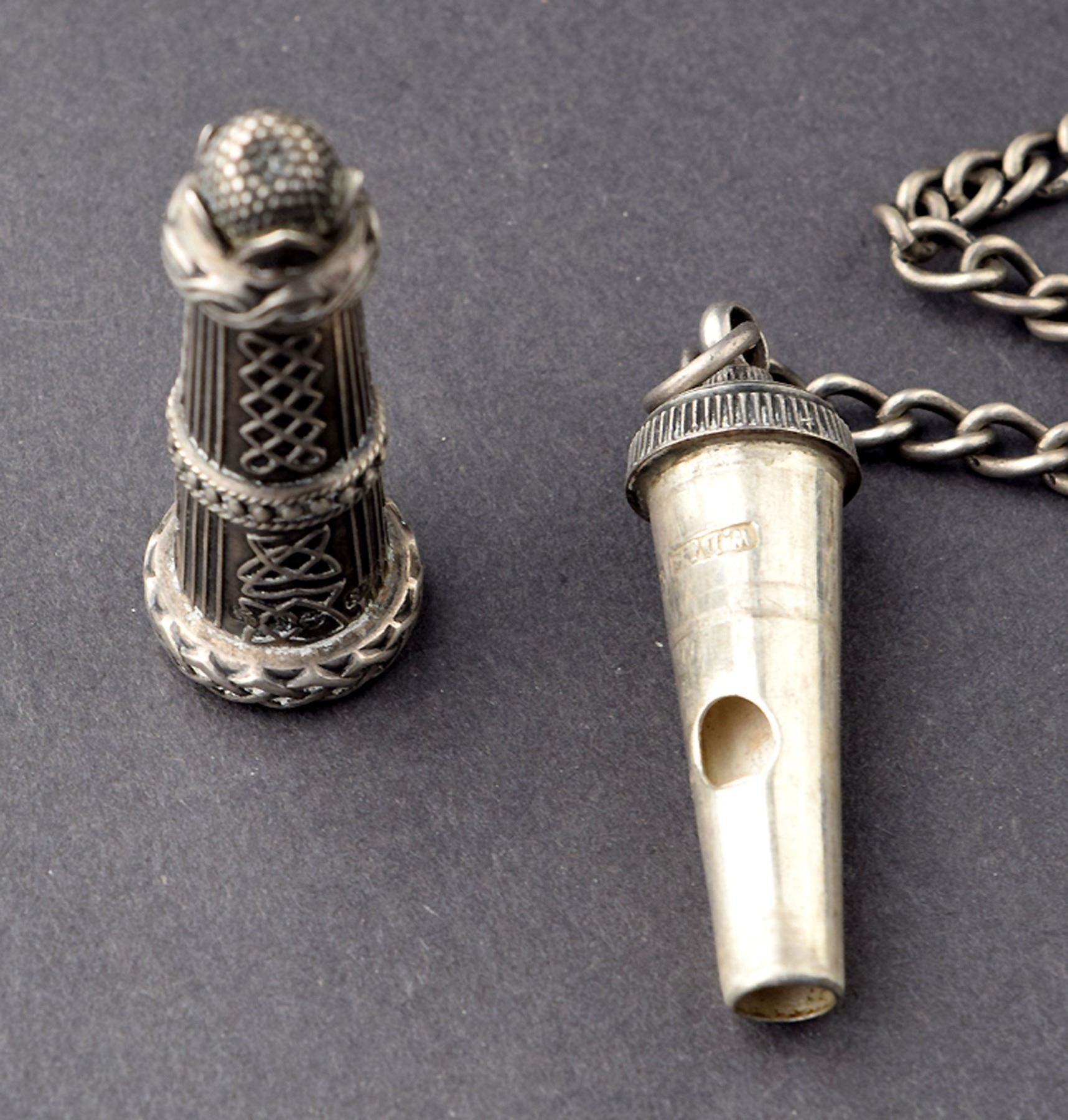British Silver Sterling Whistle, 1897, with chain and fob, cased.