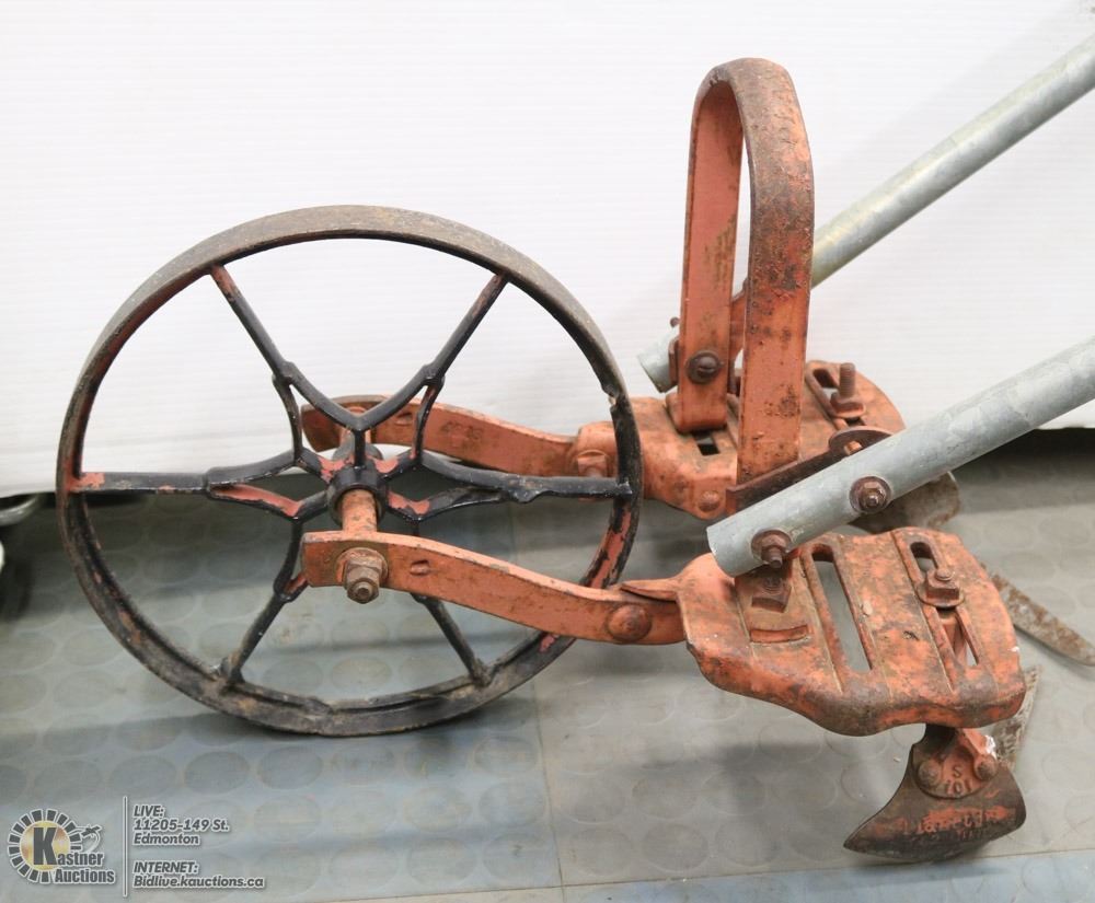 ANTIQUE GARDEN TILLER.