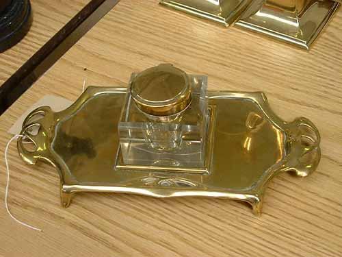 An Art Nouveau style brass ink stand inscribed Geschutzt, L 26cms, a ...