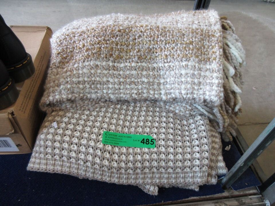 Two Neutral Coloured Knitted Throw Blankets