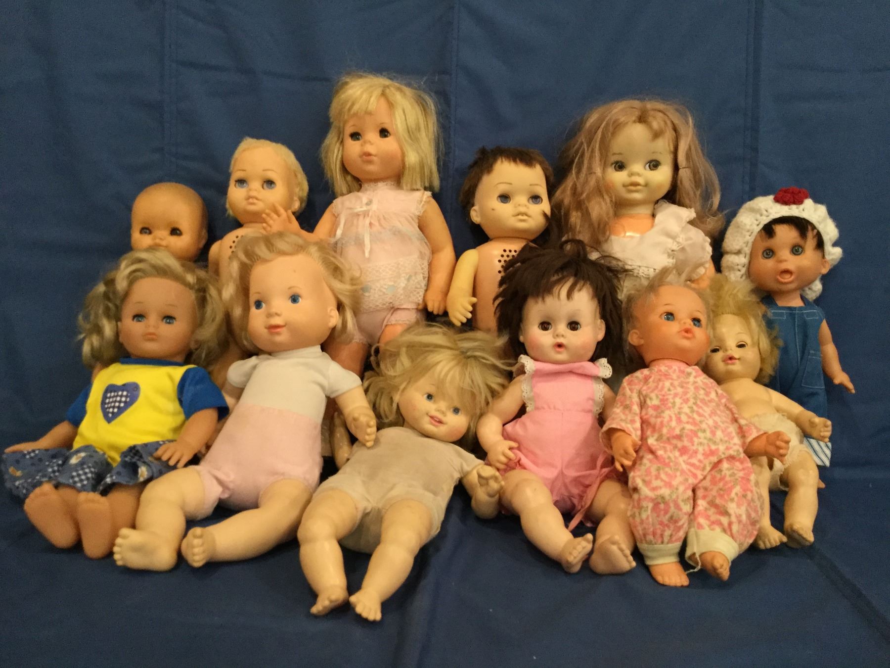 Lot of 12 dolls need of TLC