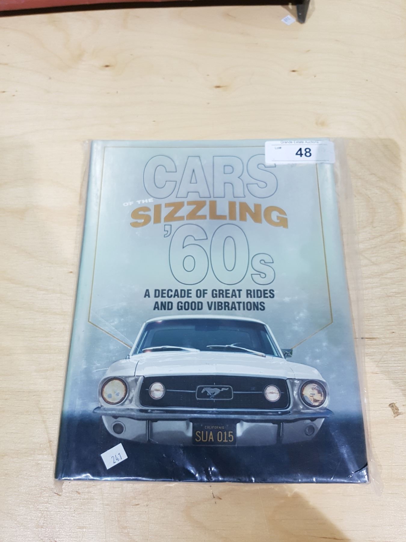 CARS OF THE SIZZLING 60'S LARGE HARD COVER BOOK