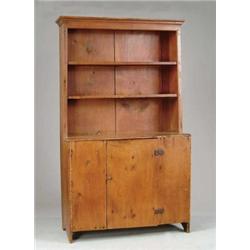 GOOD EARLY 18TH CENTURY PINE STEP BACK CANT BACK CUPBOARD.