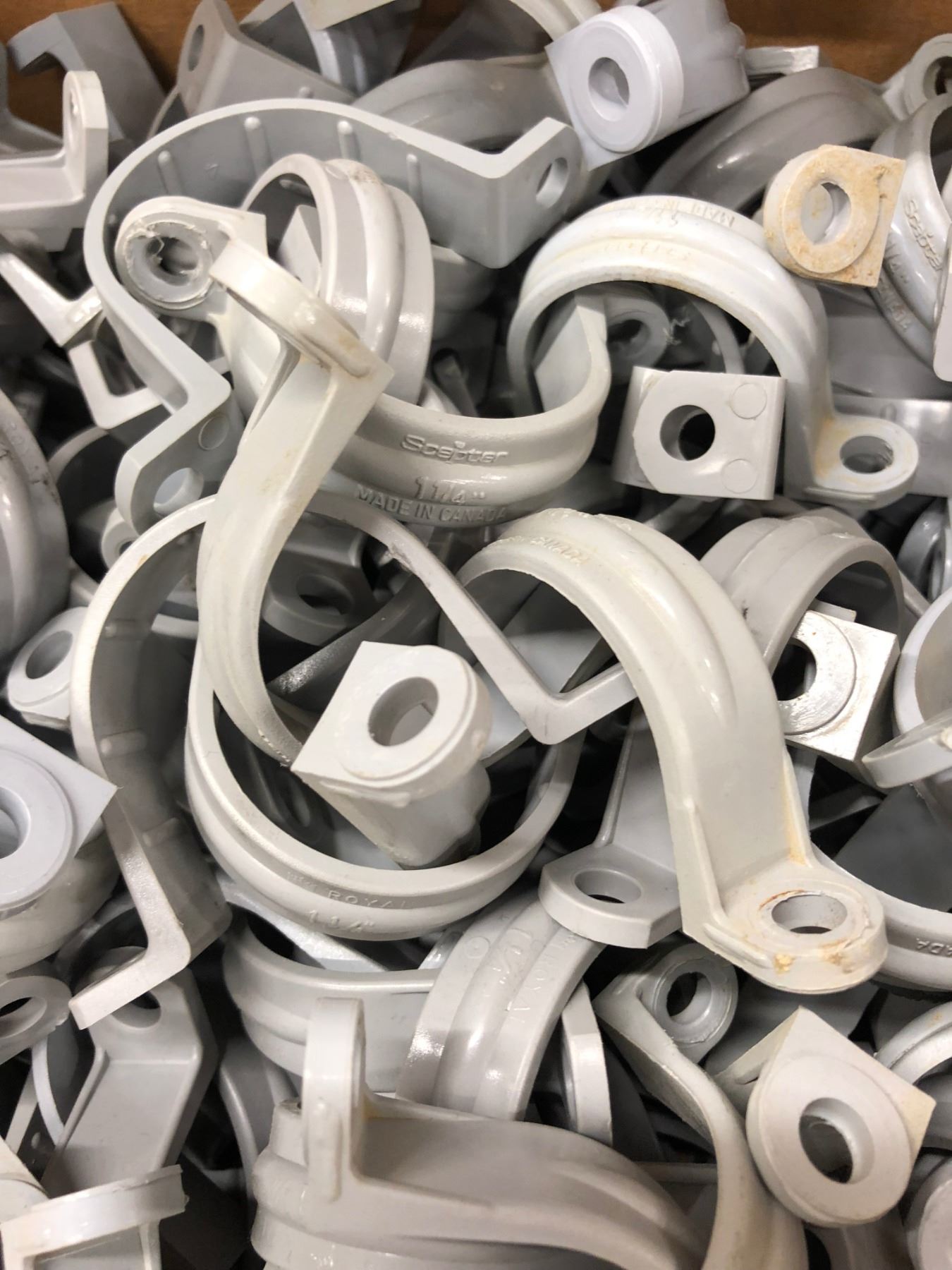 Row of 5 Boxes of PVC Straps from 1/2" to 1 1/2", 1 Box 90 Degree ...