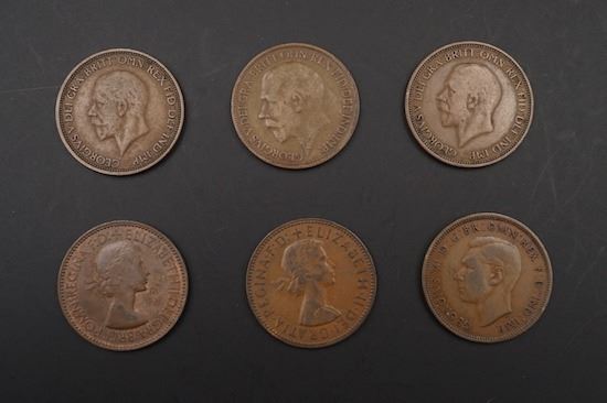Six British Penny Coins.