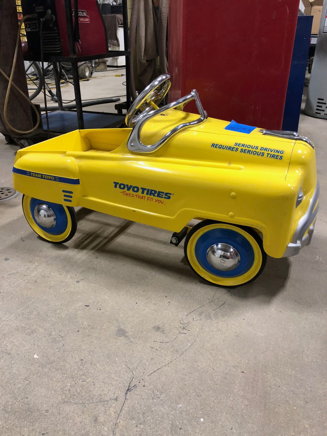 Kids Toyo Tires Pedal Car yellow in colour