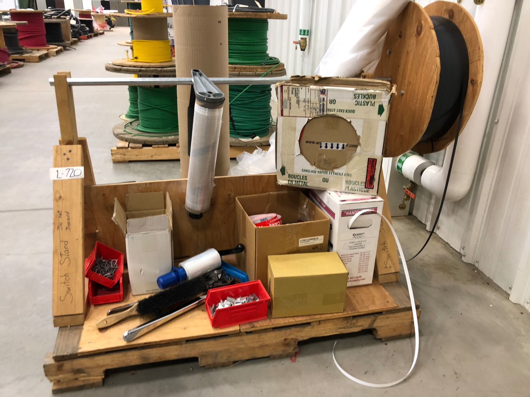 Shipping supplies, roll of poly, Uline bander & crimper, boxes of ...