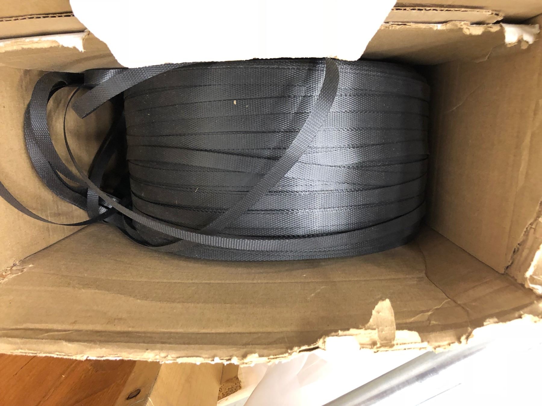 Shipping supplies, roll of poly, Uline bander & crimper, boxes of ...