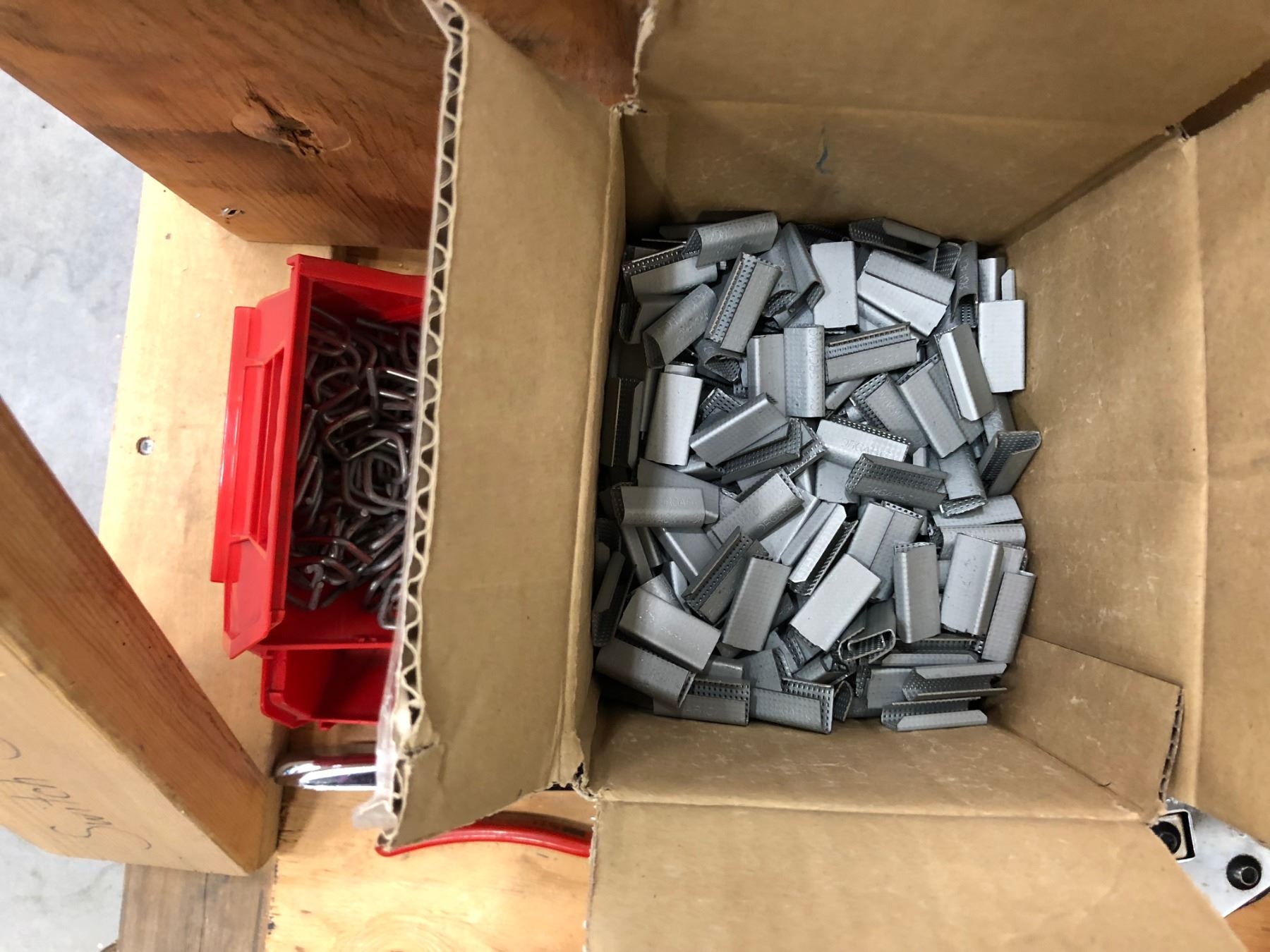 Shipping supplies, roll of poly, Uline bander & crimper, boxes of ...