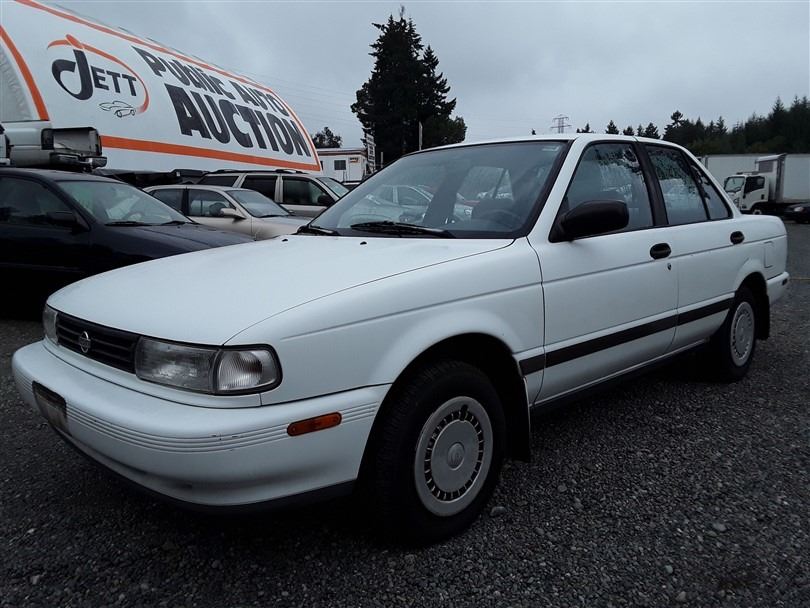 A1 -- 1992 NISSAN SENTRA SEDAN, WHITE, 230,283 KMS