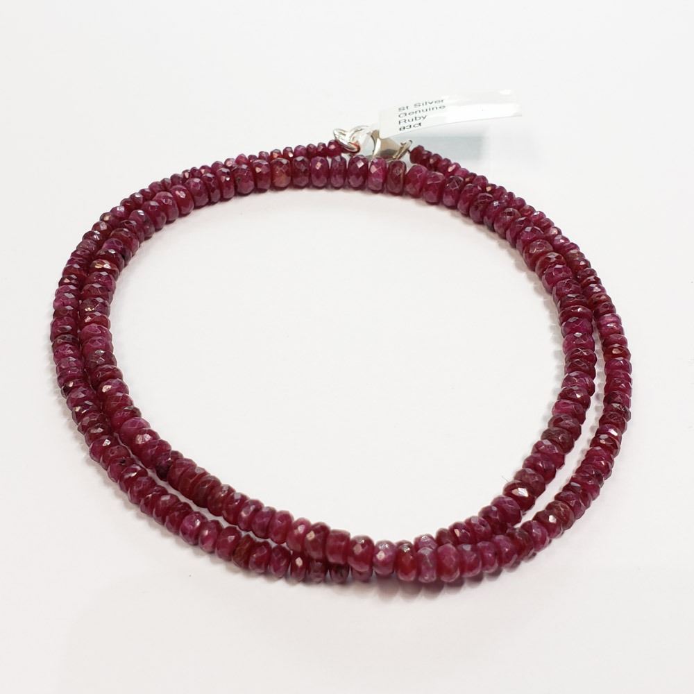 24) STERLING SILVER NATURAL RUBY BEAD NECKLACE - Kastner Auctions