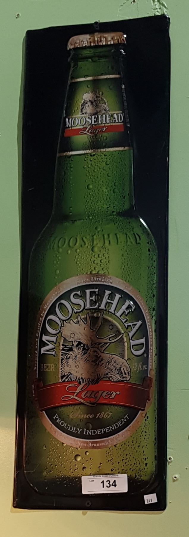 EMBOSSED MOOSEHEAD LAGER TIN BEER SIGN