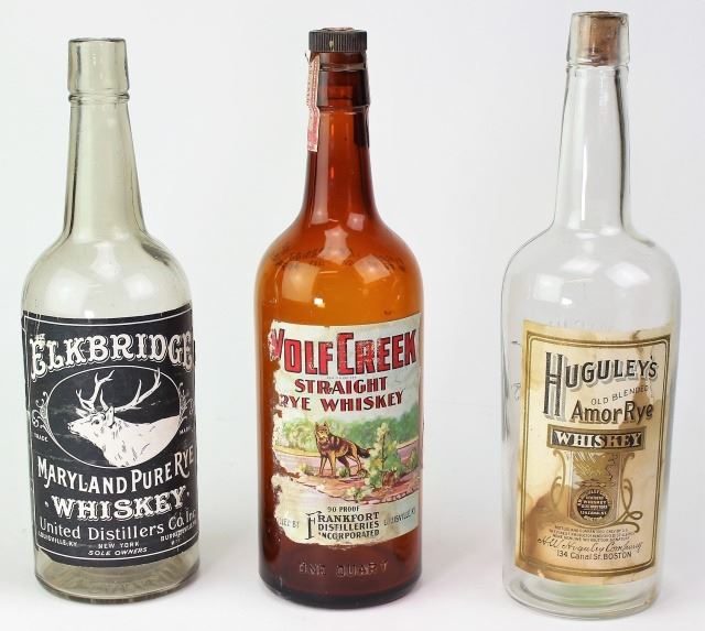 Collection of 3 pre prohibition whiskey bottles
