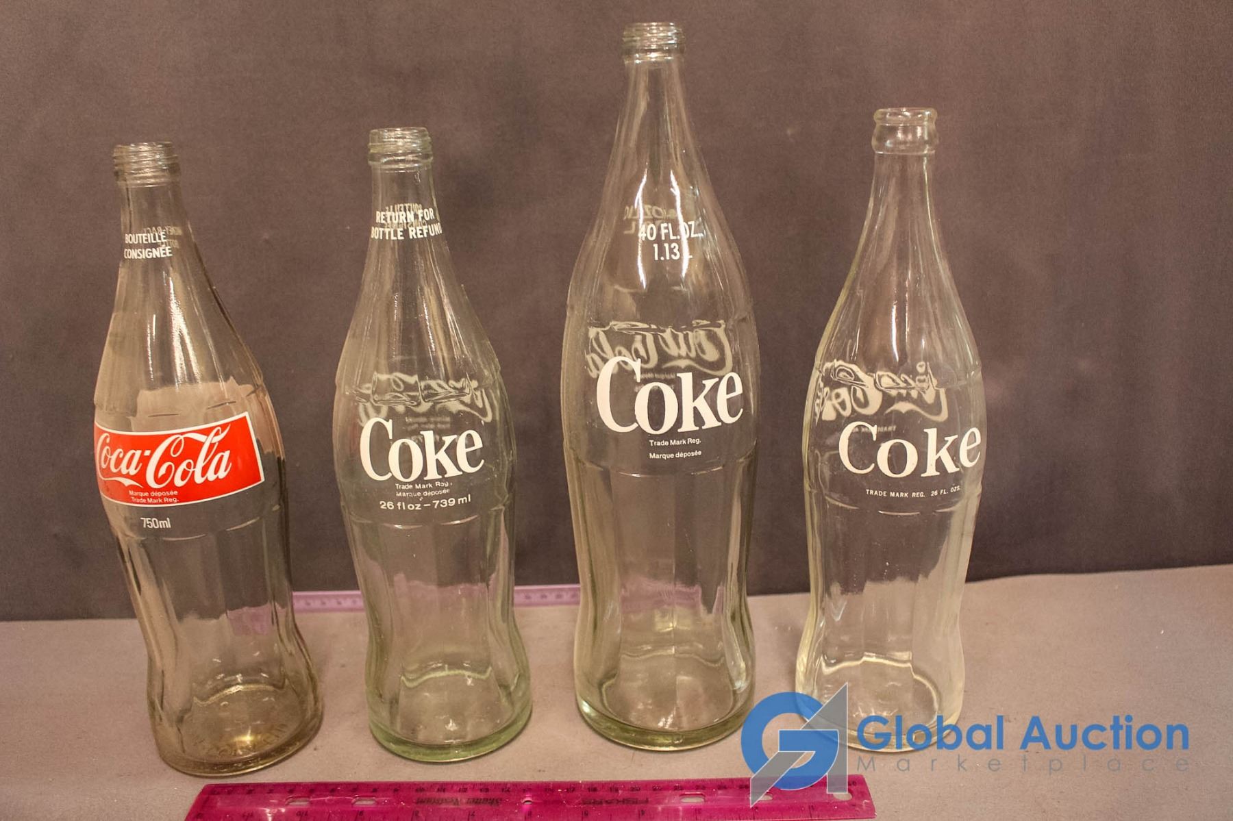 4 Large Vintage Coca Cola Bottles 1 - 1.13L, 1- 750ml, 2- 739ml