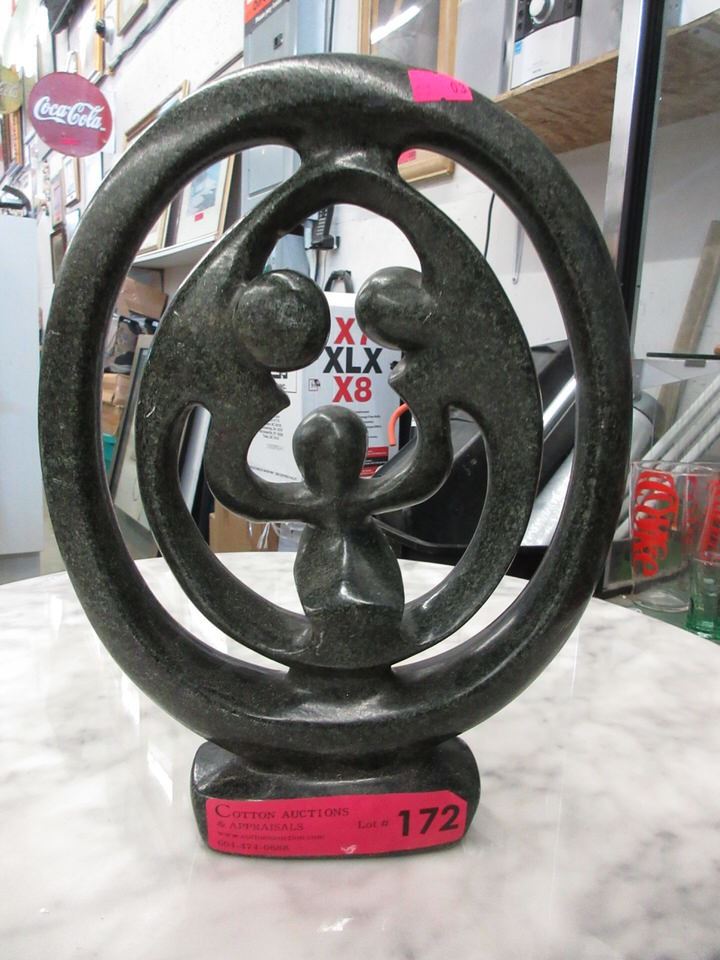Carved Stone Statue - Family Circle