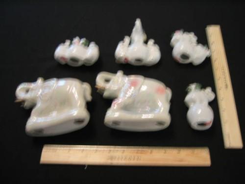 Six elephants, two sets, one set of 4 white elephants, with gold trim ...