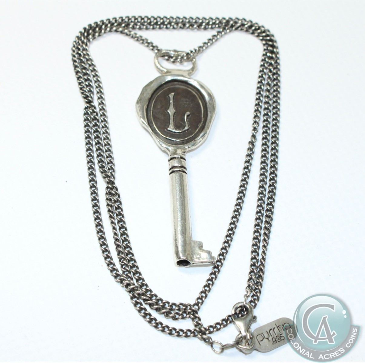 PYRRHA Sterling Silver Necklace & Key Pendant. Chain is 28 inches.