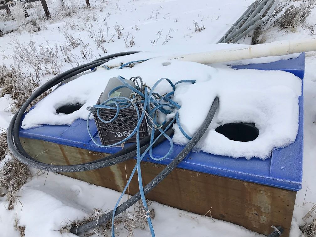 Dugout watering system. Large insulated tank, 24 Volt pump. c/w ...