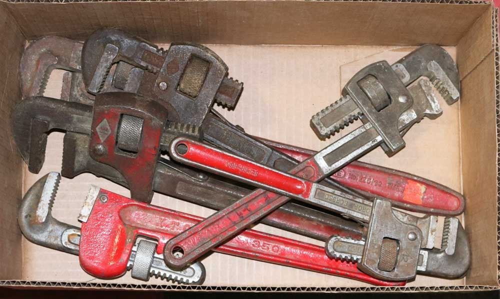 BOX OF PIPE WRENCHES