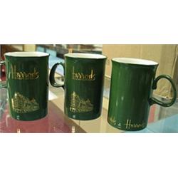 Set of three official Harrods mugs in green with gold accents "Produced ...
