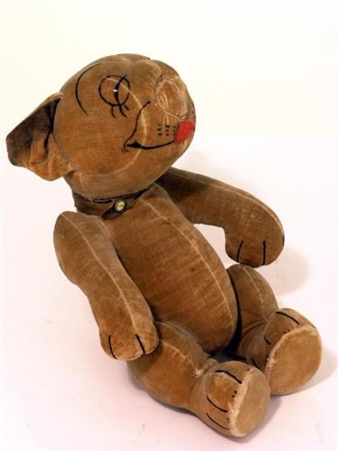 A Deans soft toy, "Bonzo", 1920's, with printed detail and jointed ...