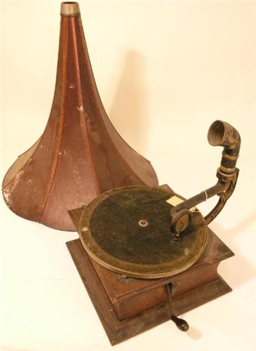 A Swiss made wind up gramophone, with cast armature and wooden horn, 13ins