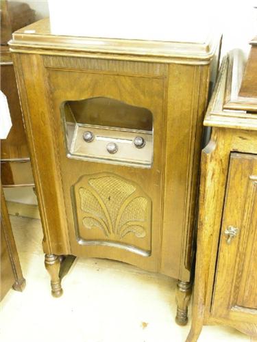 A 1930's Marconi radiogram, with Marconiphone pick up, in walnut ...