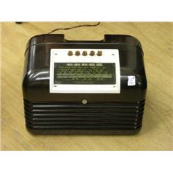 A Bush Model DAC10 brown Bakelite radio, with cream knobs and dial ...