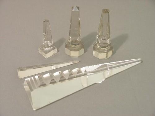 A prismatic cut glass obelisk, depicting an Oriental pagoda, two ...