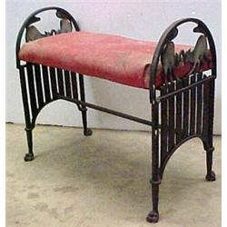 Cast iron bench with double cats on picket fence d