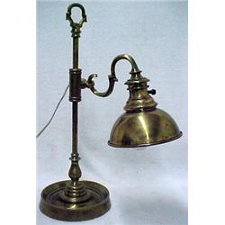 Brass desk lamp; adjustable height bridge lamp; on